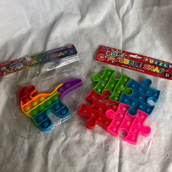 Toys | Lot Of 2 Packages Pop Bubble Snap 4pc Puzzle Rainbow Dinosaur ...